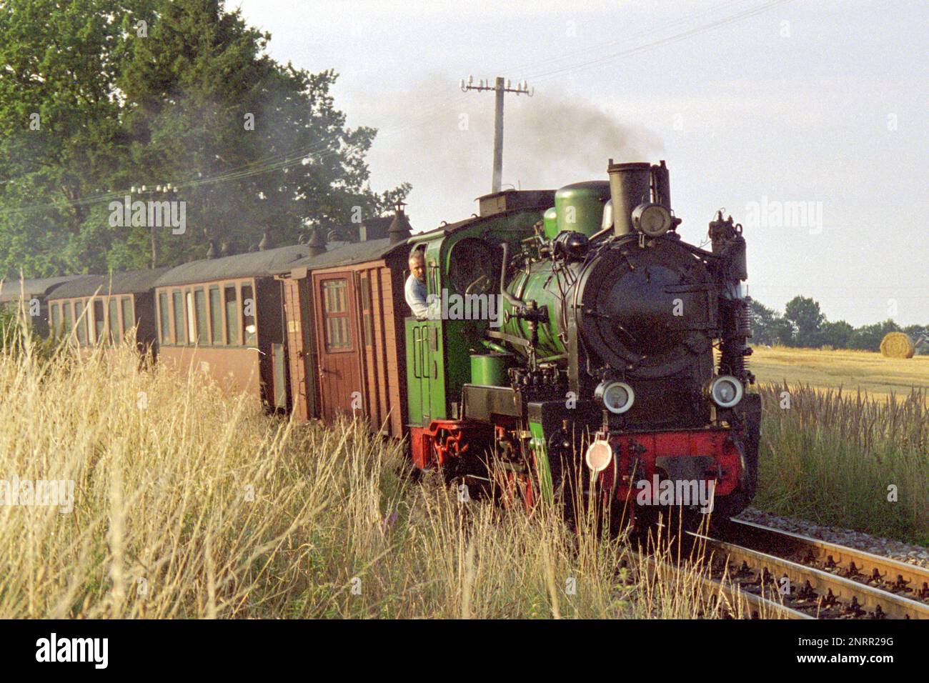 A steam train on the narrow gauge railway at Rugen in 1999 Stock Photo ...