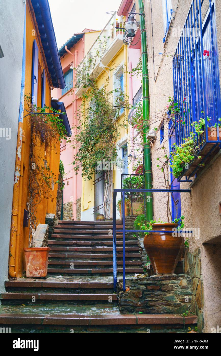 Pretty idylic old mediterranean houses with colorful shuttered windows ...