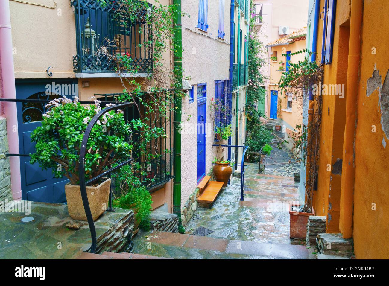 Pretty idylic old mediterranean houses with colorful shuttered windows ...