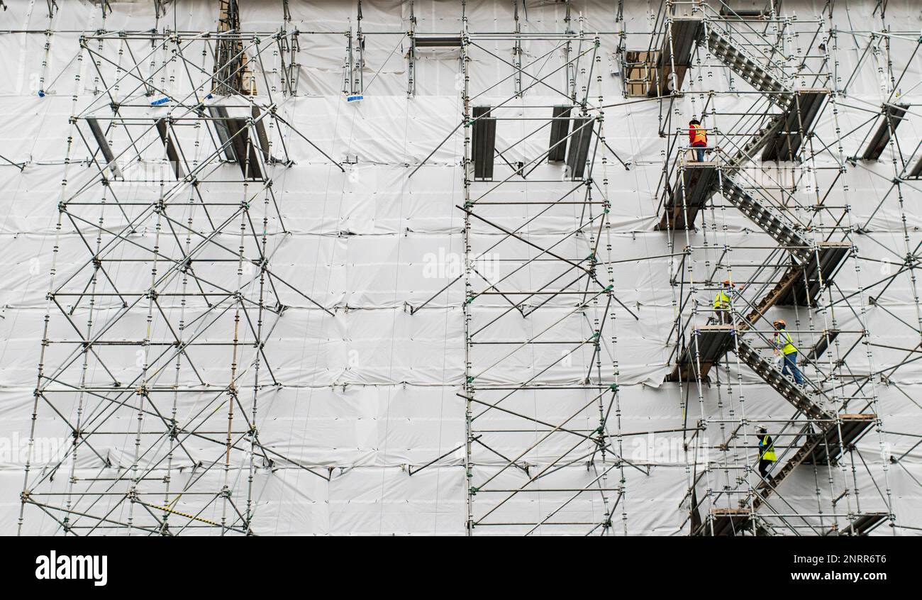 UNITED STATES - OCTOBER 22: Workers use the temporary external stairs ...