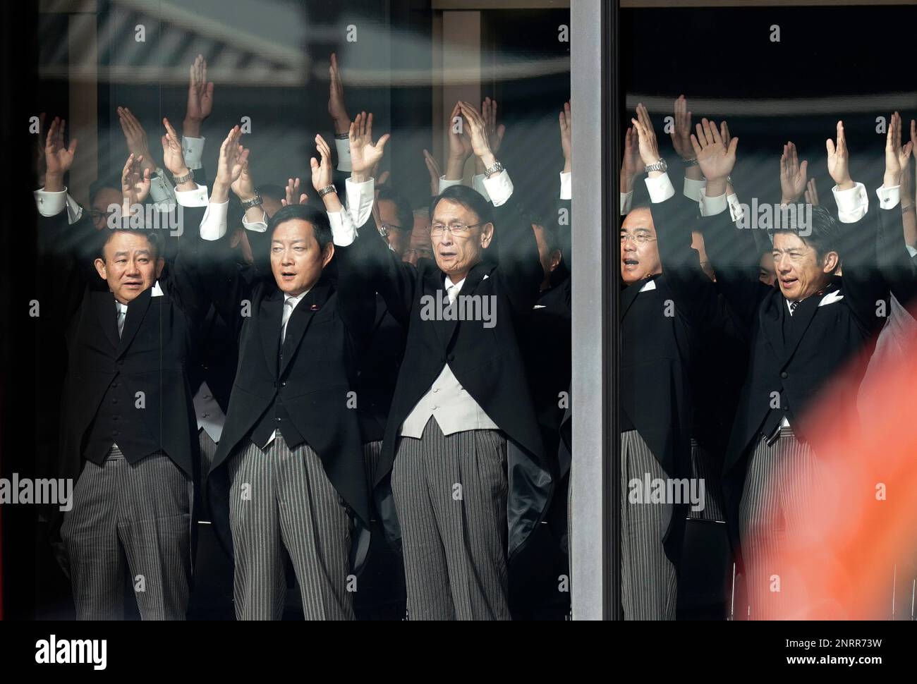 Attendants chant 'Banzai' during the enthronement ceremony after ...