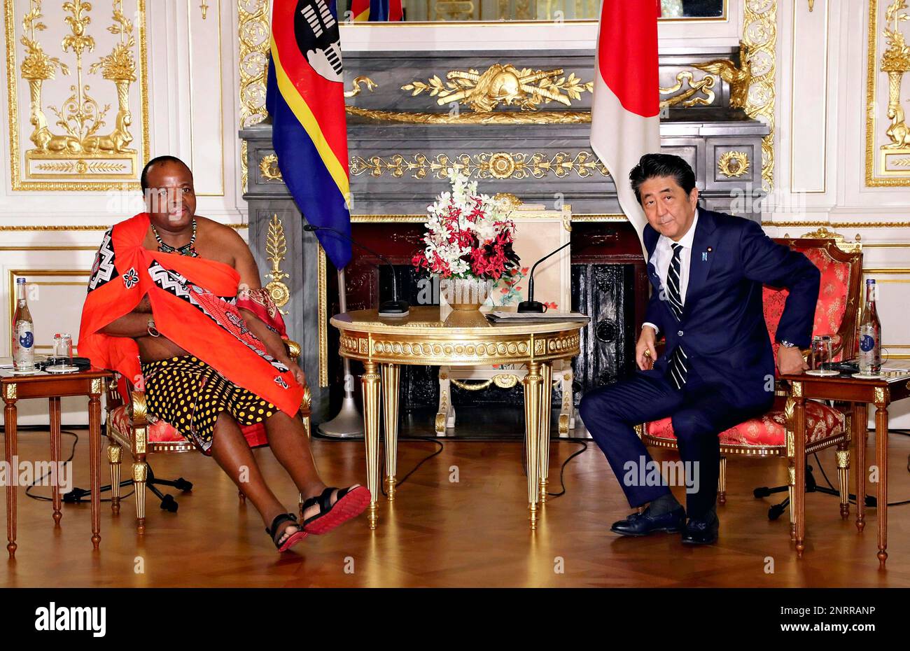 Japanese Prime Minister Shinzo Abe (R) and Eswatini King Mswati hold ...