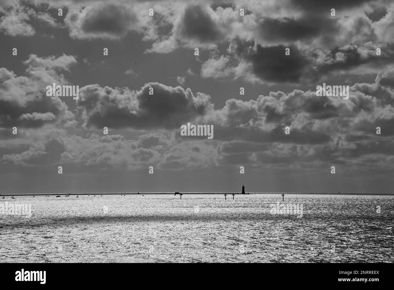 A dark foreboding sky provides the backdrop to the lighthouse at the ...