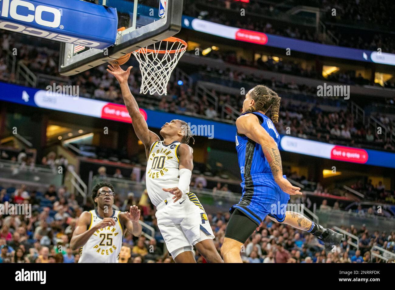 Indiana Pacers guard Bennedict Mathurin (00) shoots under pressure from ...