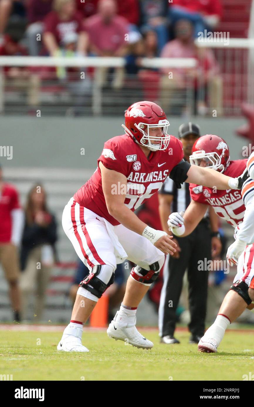 October 19, 2019: Razorback center Ty Clary #66 works to seal his ...