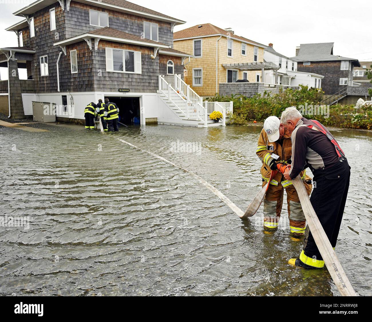 Groton Long Point Fire Department deputy chief Arnie Lotring, left, and ...
