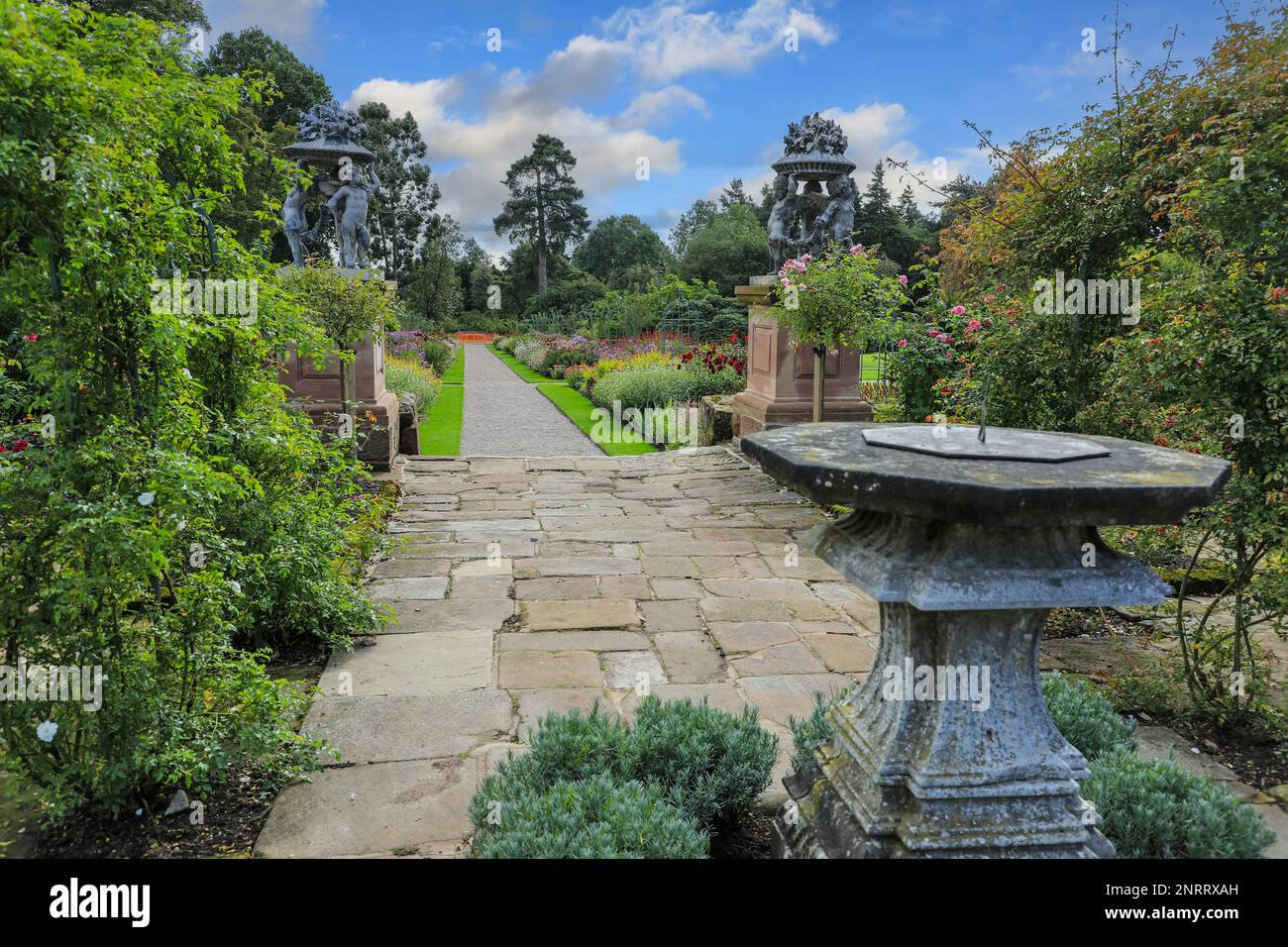 A path through the gardens at Cholmondeley Castle gardens country house ...