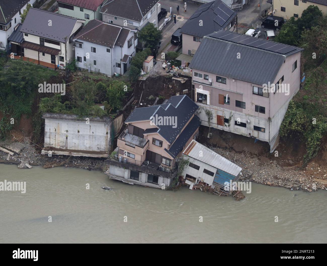 An aerial photo slided down into a river in Akiruno, Tokyo on Oct.16 ...