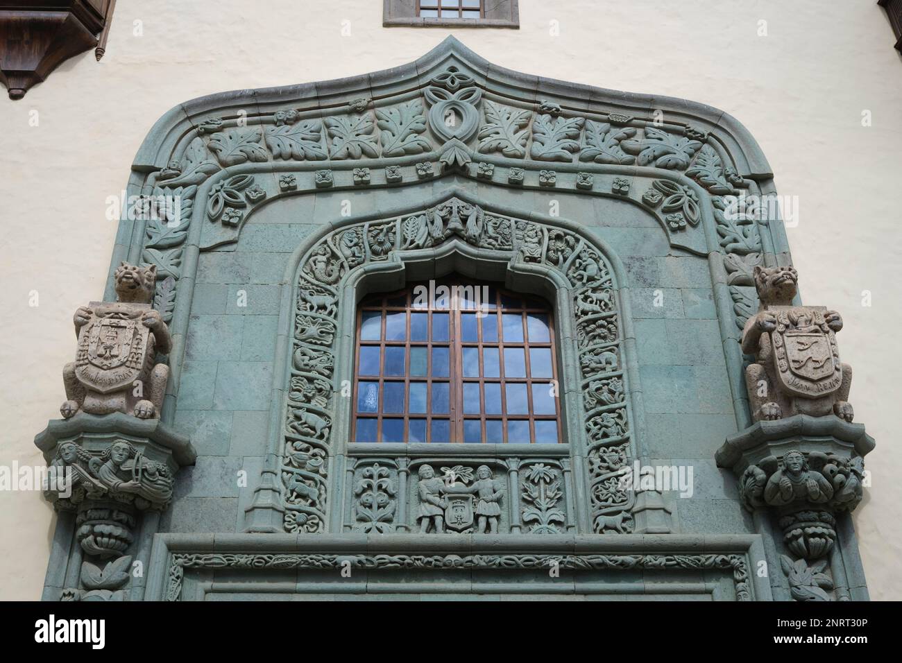 Window of15th century building with decorations and sculptures Stock ...