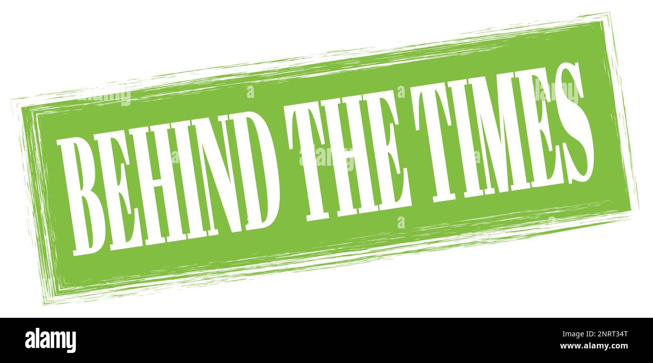 BEHIND THE TIMES text written on green rectangle stamp sign Stock Photo ...