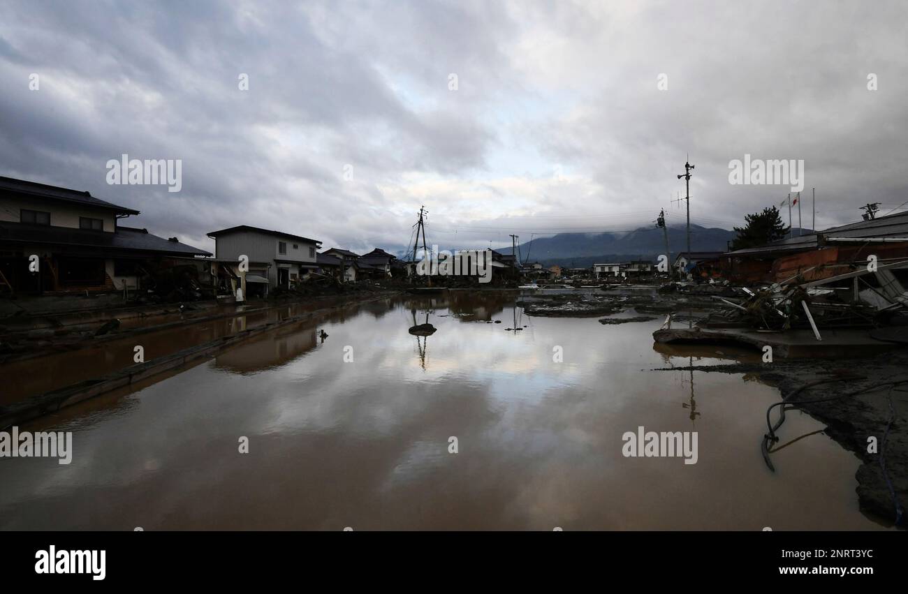 A photo shows a residential area where was flooded as the banks of ...