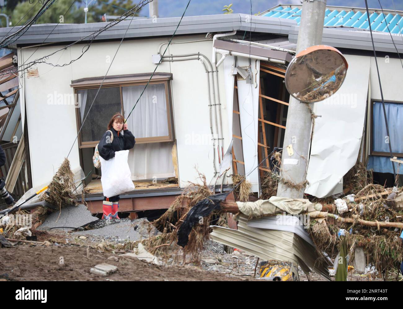 A photo shows a residential area where was flooded as the banks of ...