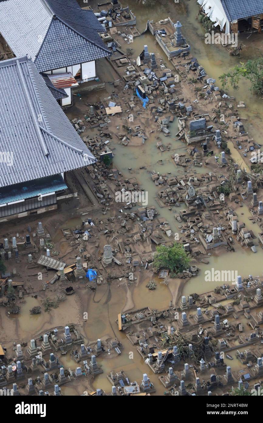 An aerial photo shows a graveyard in residential area where was flooded ...
