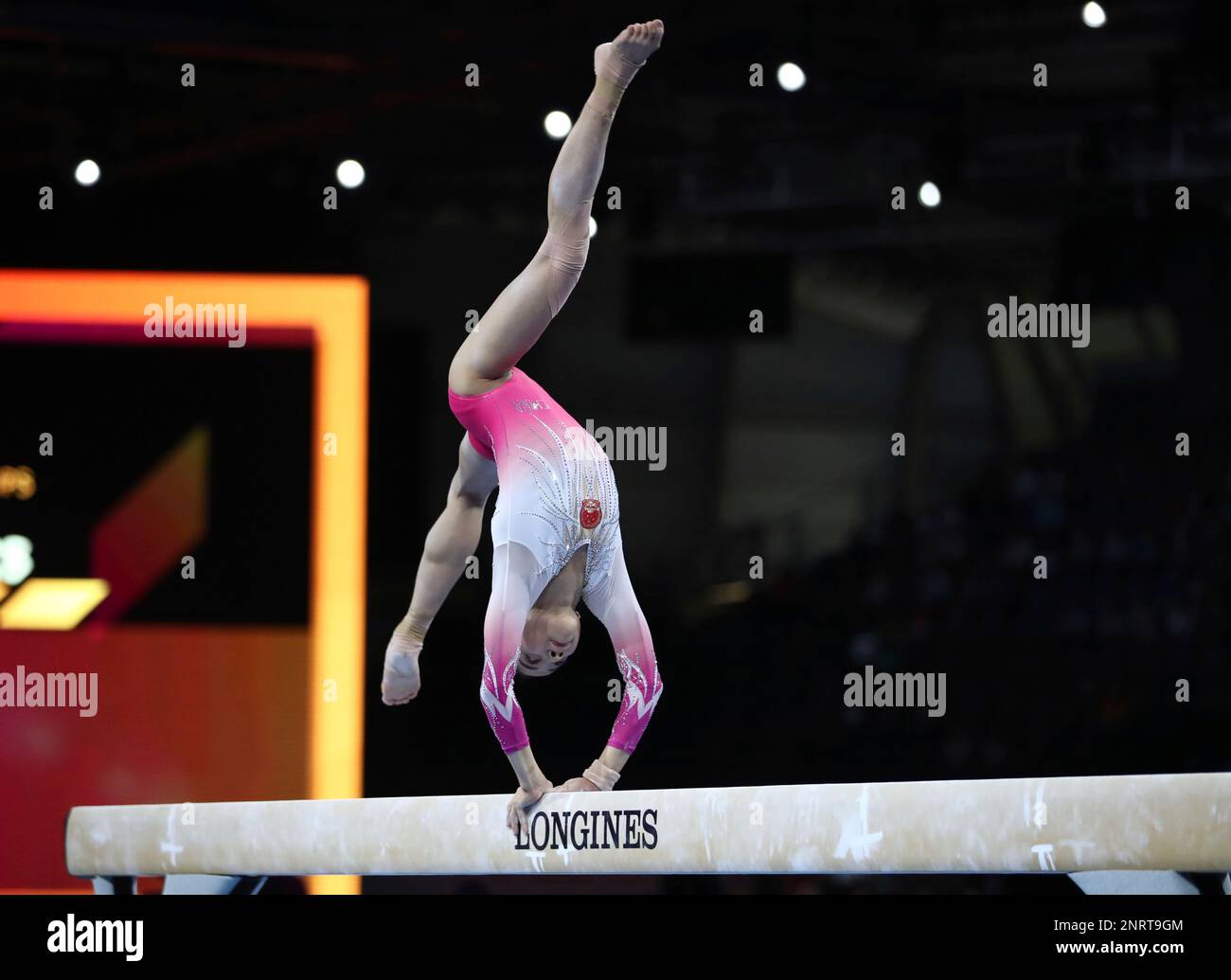 LI Shijia of China performs the final apparatus of Women's Balance Beam ...