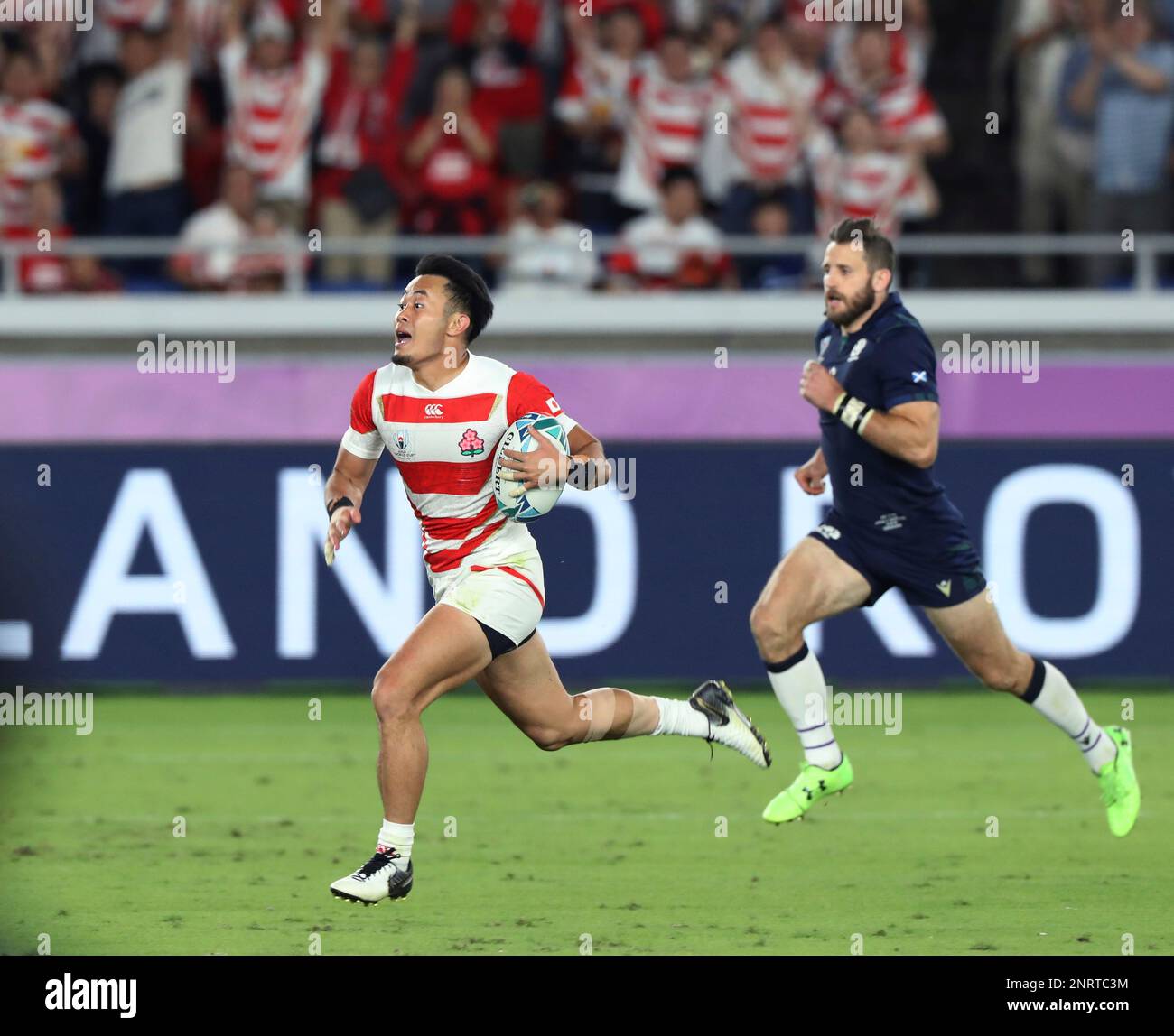 Kenki Fukuoka (11) of Japan tries in the second half of the Rugby World ...
