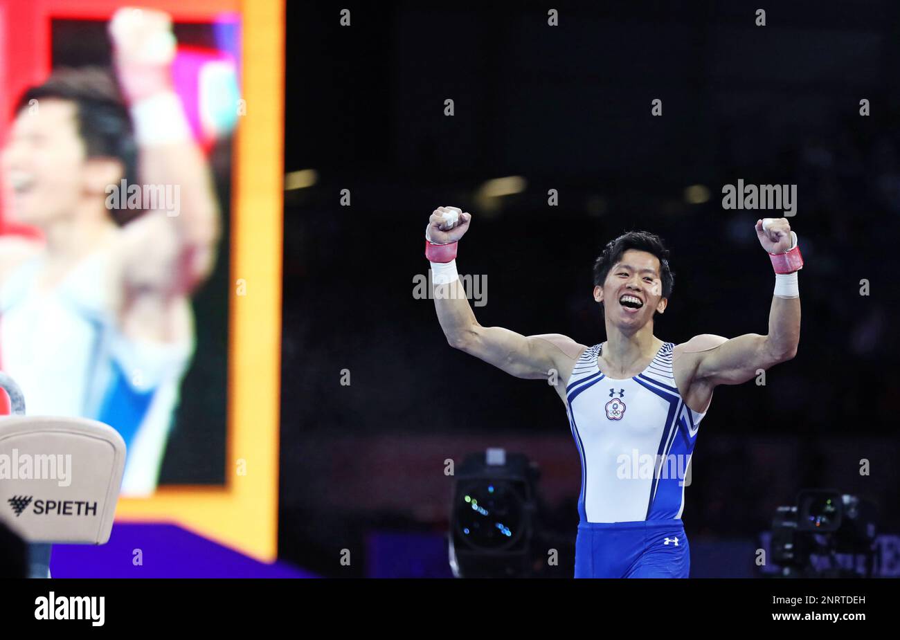 Chih Kai Lee of Chinese Taipei reacts after performing final apparatus of men pommel horse in ...