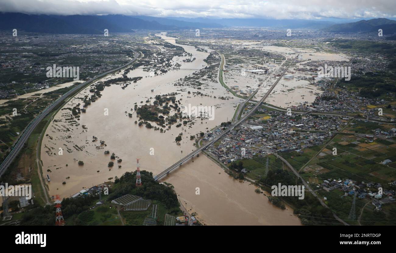 Residential area is covered with water as the banks of Chikuma river ...