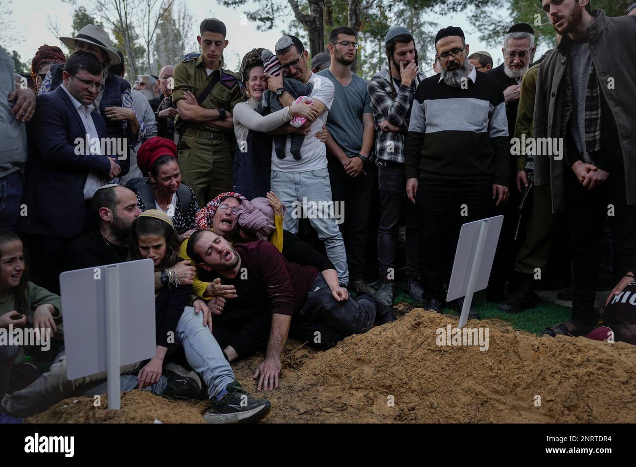 Family members and friends of Hillel Yaniv, 21, and Yagel Yaniv, 19 ...