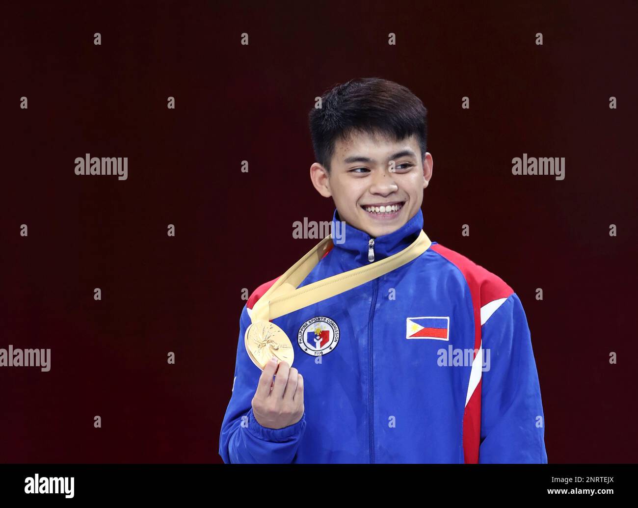 Carlos Edriel Yulo of Philippines celebrates during an award ceremony ...