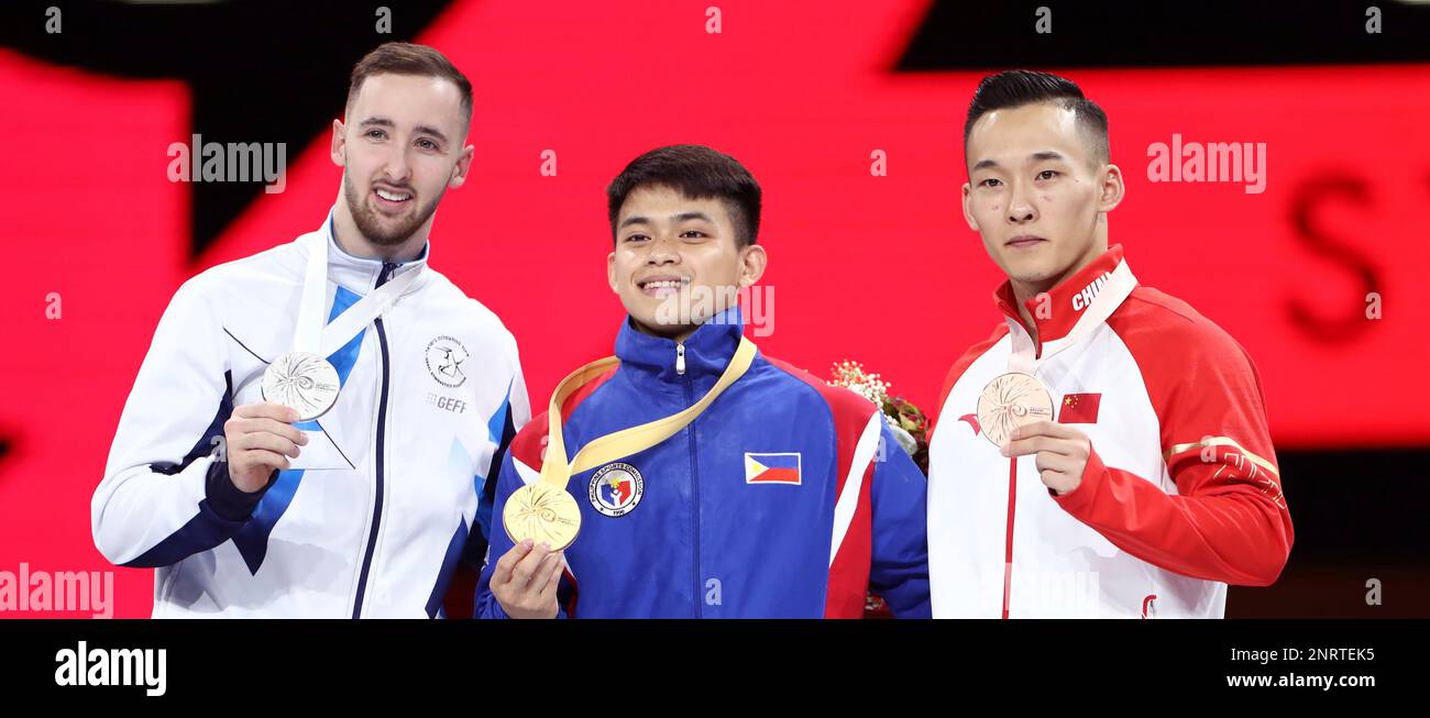 (L-R) Artem Dolgopyat of Israel, silver, Carlos Edriel Yulo of ...