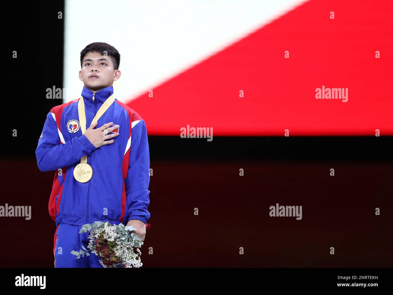 Carlos Edriel Yulo of Philippines celebrates during an award ceremony ...