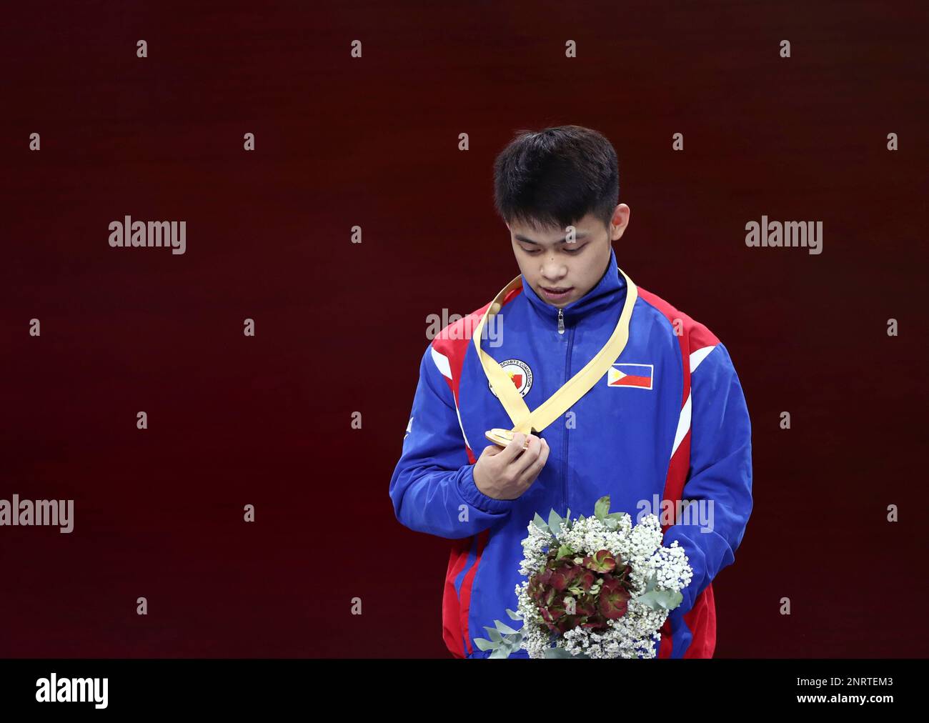 Carlos Edriel Yulo of Philippines celebrates during an award ceremony ...