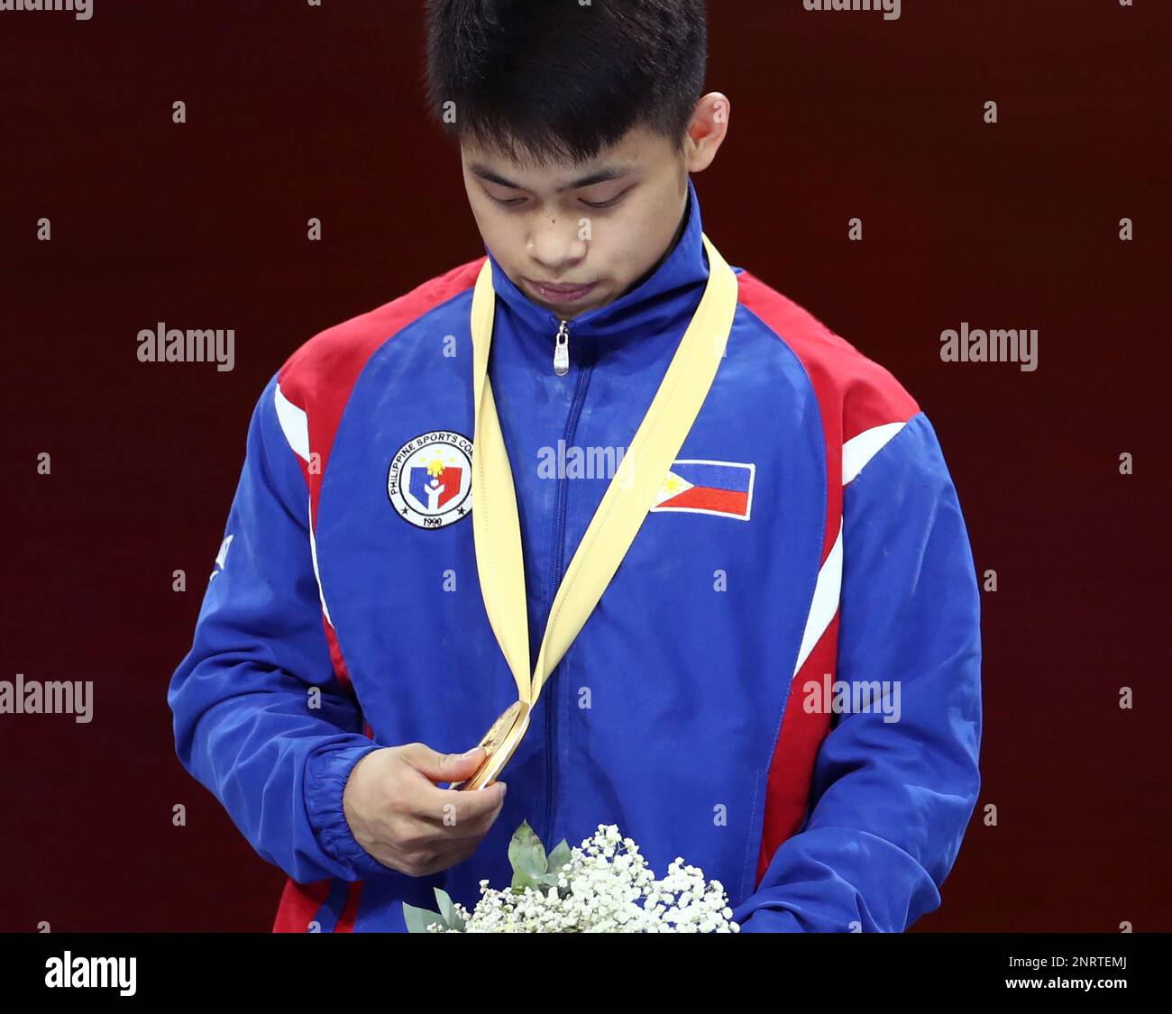 Carlos Edriel Yulo of Philippines celebrates during an award ceremony ...
