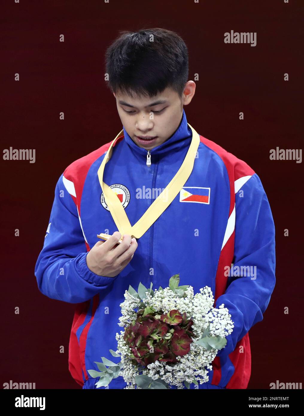 Carlos Edriel Yulo of Philippines celebrates during an award ceremony ...