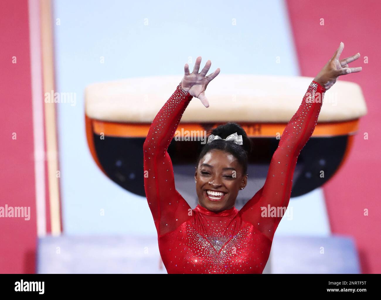 Simone Biles of U.S.A. reacts after performing final apparatus of women ...