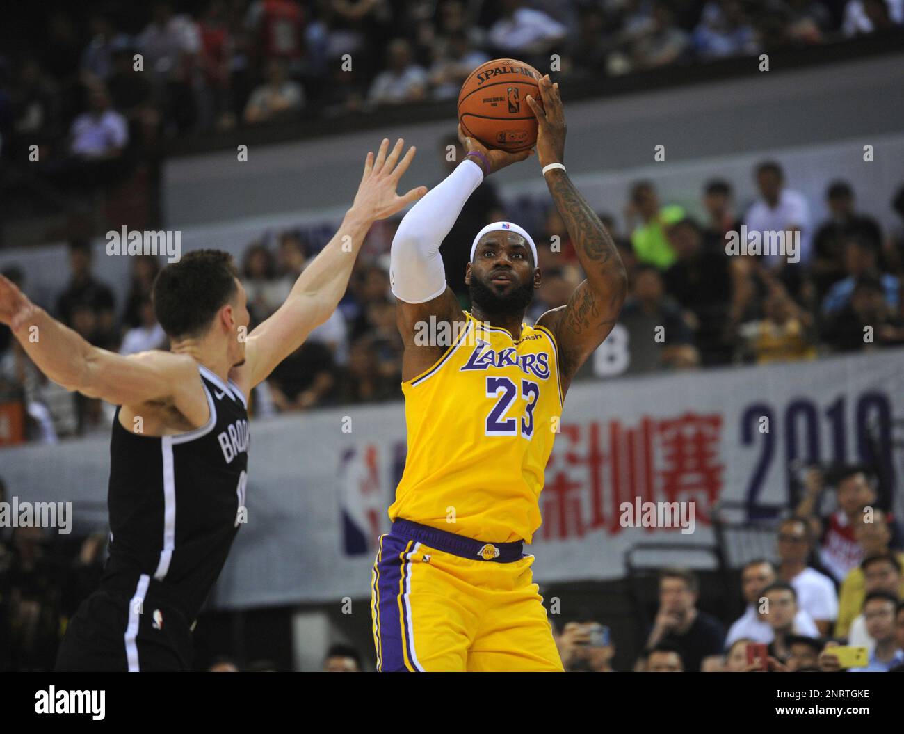 Los Angeles Lakers' LeBron James (R) in action during a match against ...