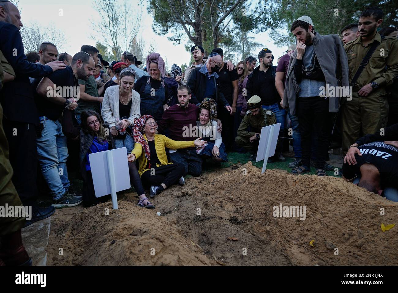 Family members and friends of Hillel Yaniv, 21, and Yagel Yaniv, 19 ...