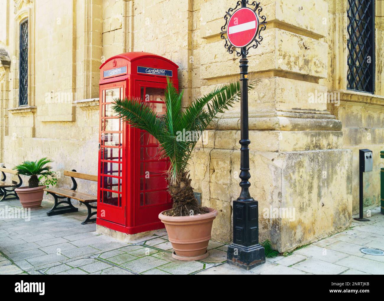 An iconic red telephone box in maltese town Mdina. Malta English ...