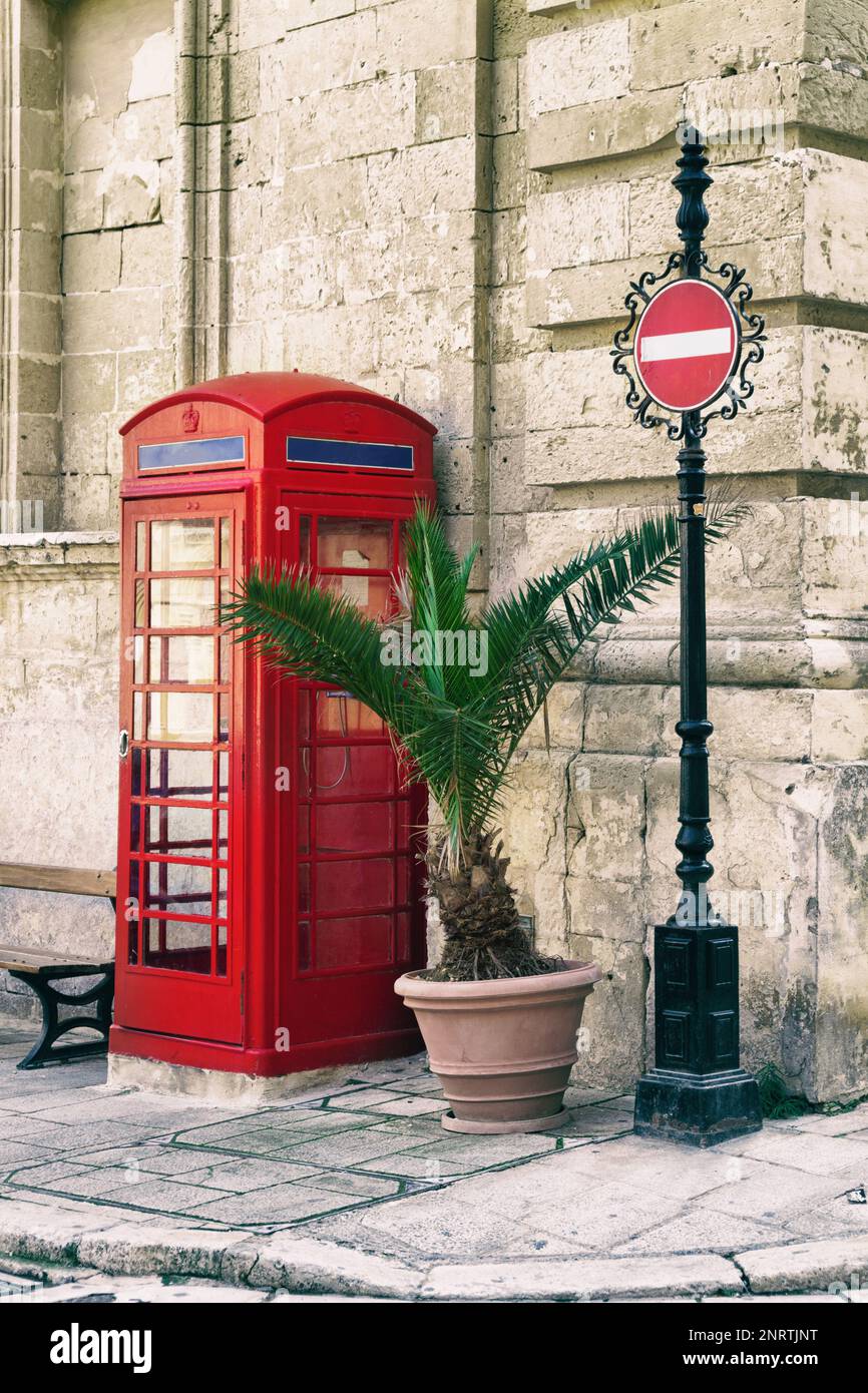 An iconic red telephone box in maltese town Mdina. Malta English ...