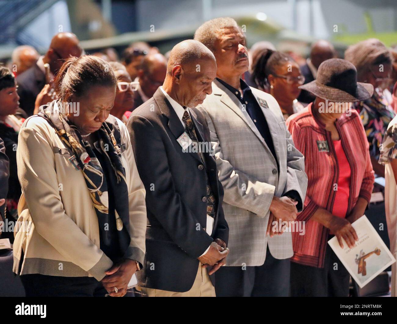 Descendants of Eugene Bullard, stand together during the invocation ...