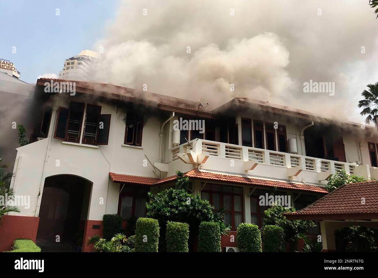 In this image made from video provided by Praram199, smoke billows from ...