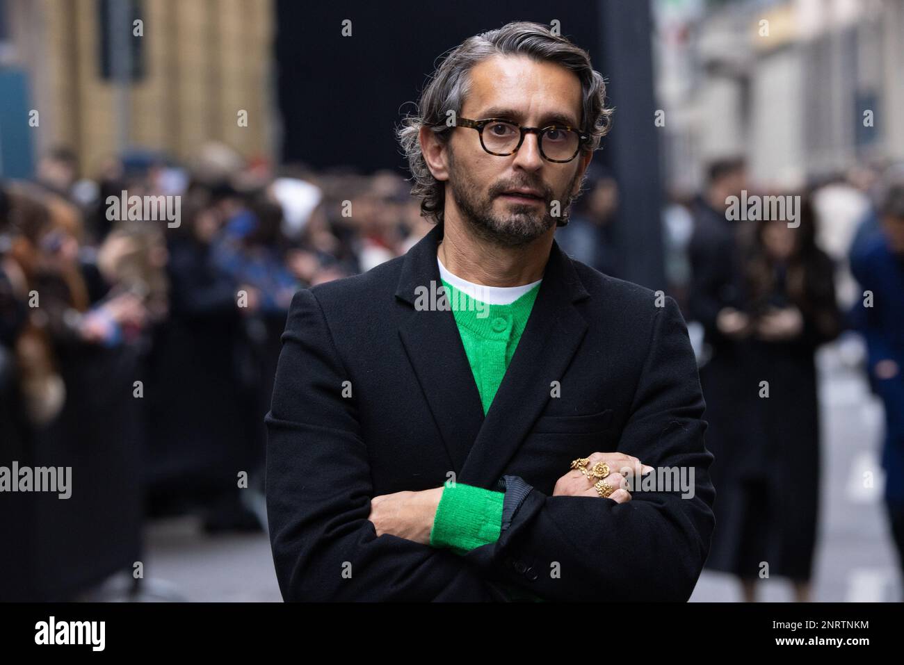 Simone Marchetti is seen on the front row of the Giorgio Armani fashion ...