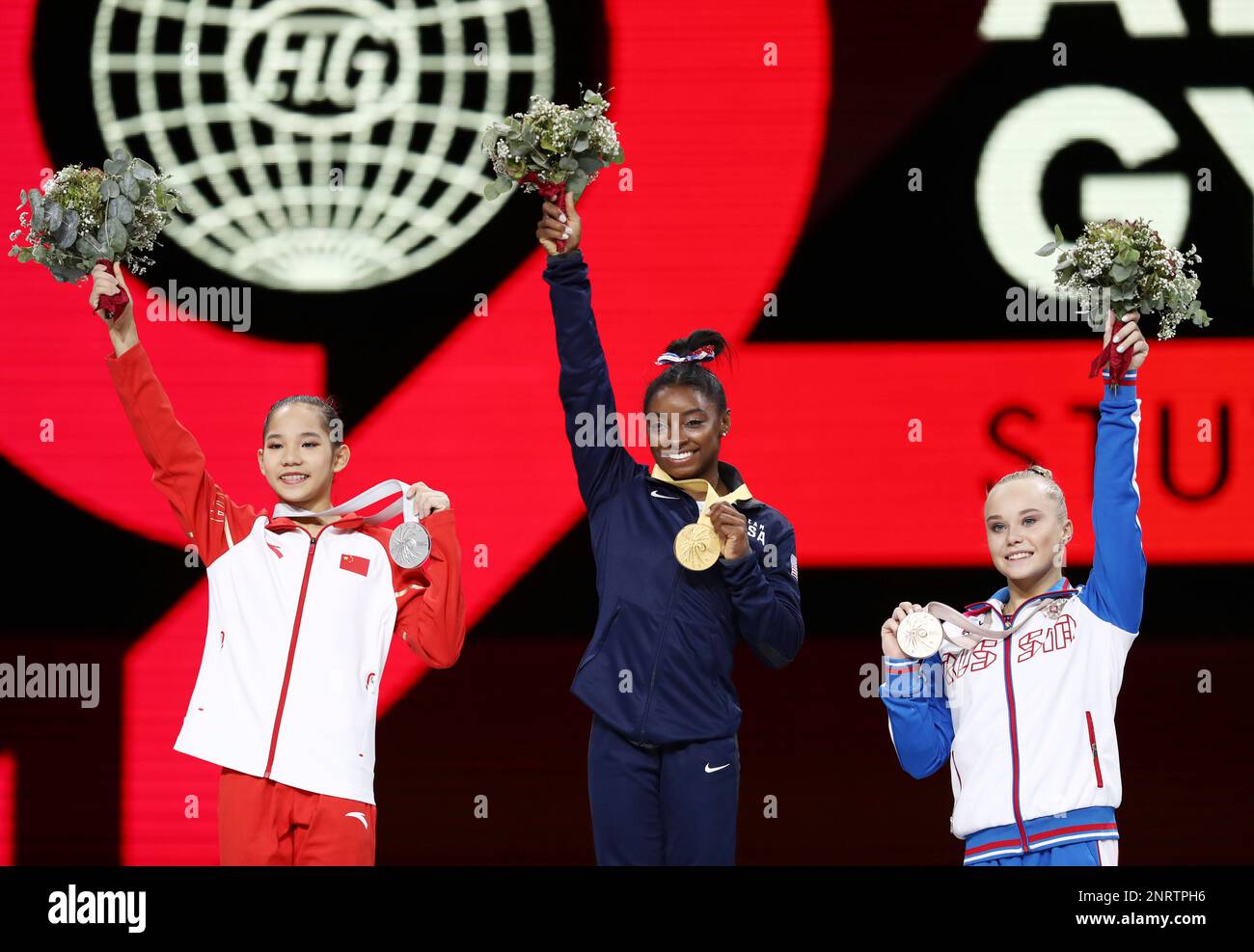 (L to R)TANG Xijing of China,silver, Simone Biles of U.S.A., gold, and ...