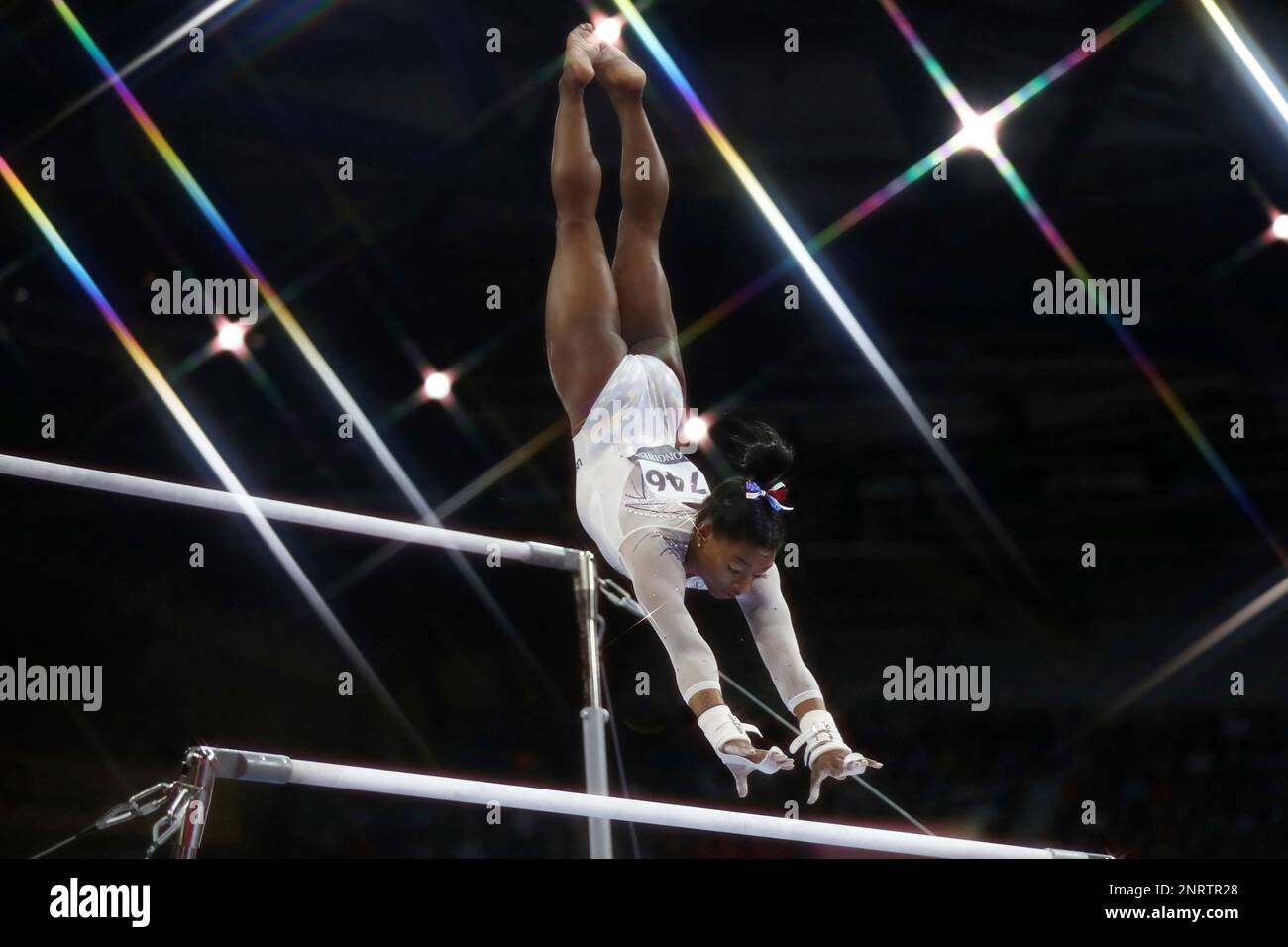 Simone Biles of U.S.A. performs uneven parallel barsduring WOMEN'S ALL ...