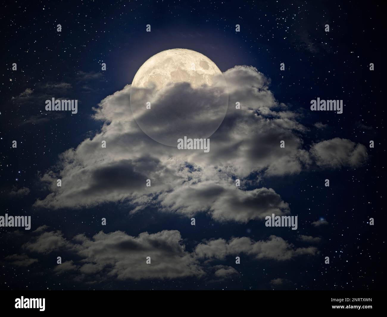 Full moon covered by a strong cloud in a full moon night Stock Photo ...