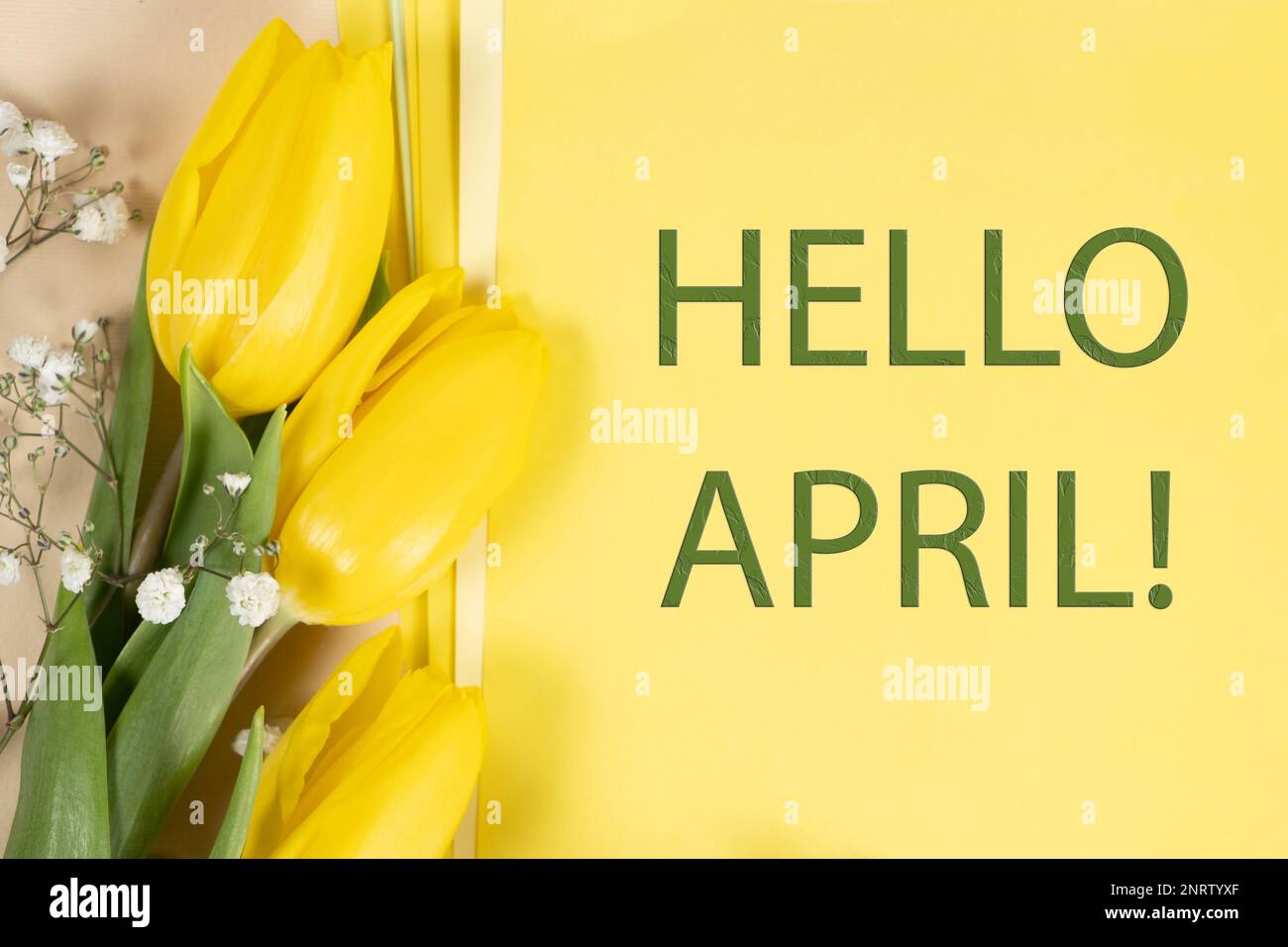 Hello April - spring postcard with yellow tulips and text Stock Photo ...