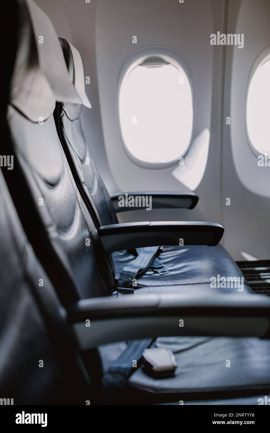 Side view of empty seats in airplane Stock Photo - Alamy