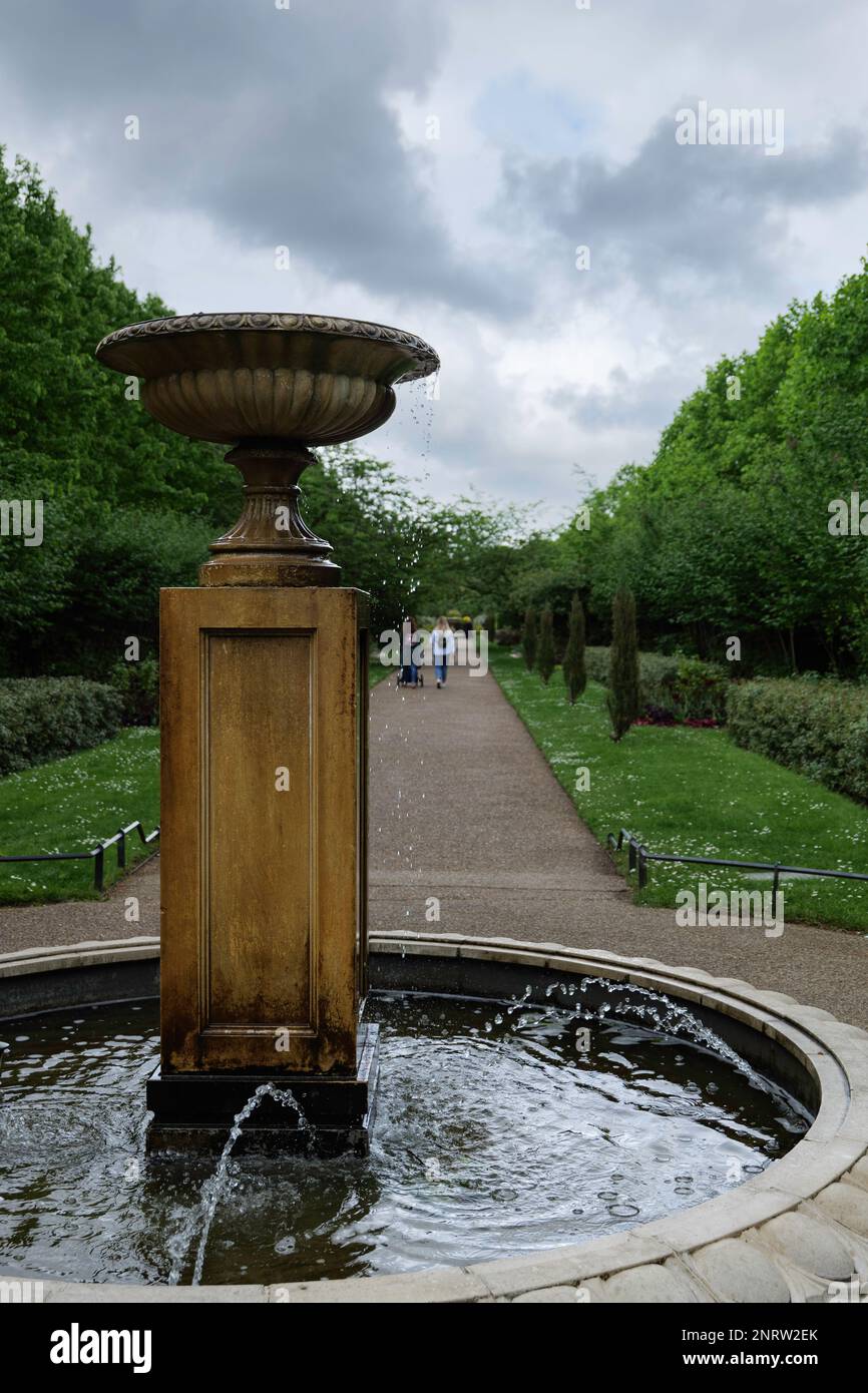 London - 05 07 2022: Close up of a column fountain in a public garden ...