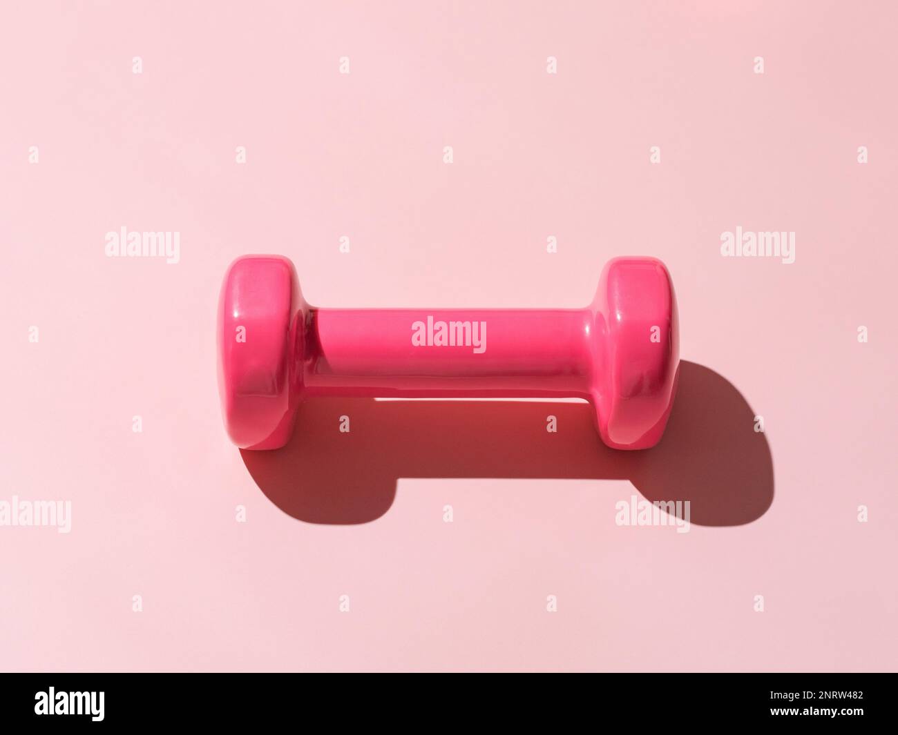 Stylish pink fitness training and gym concept. Perspective view of pink ...