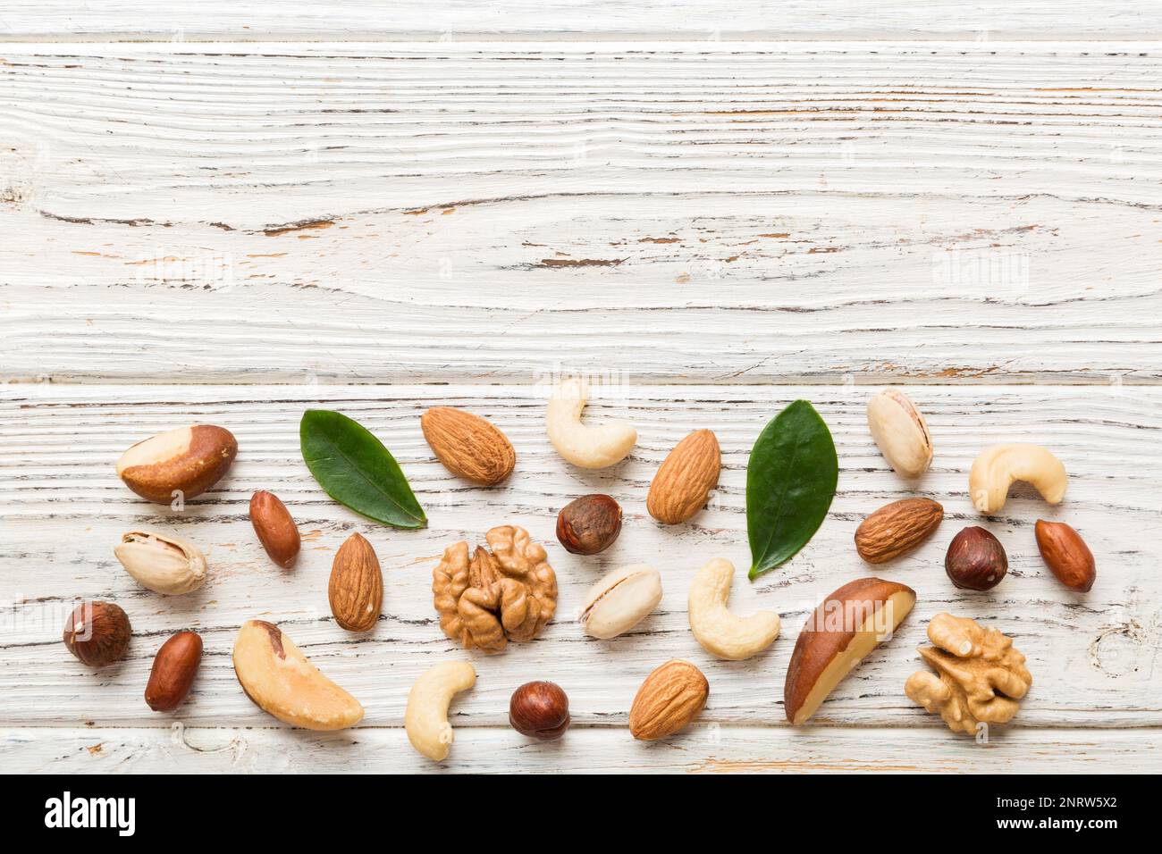Composition of nuts , flat lay - mix hazelnuts, cashews, almonds on ...