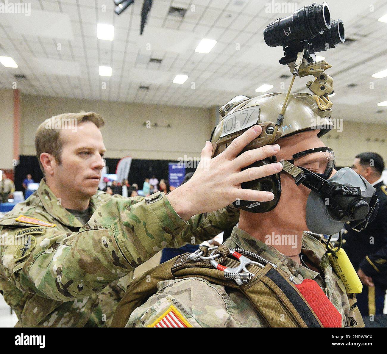 U.S. Army Maj. Derick Taylor (left), commander of the Military Freefall ...