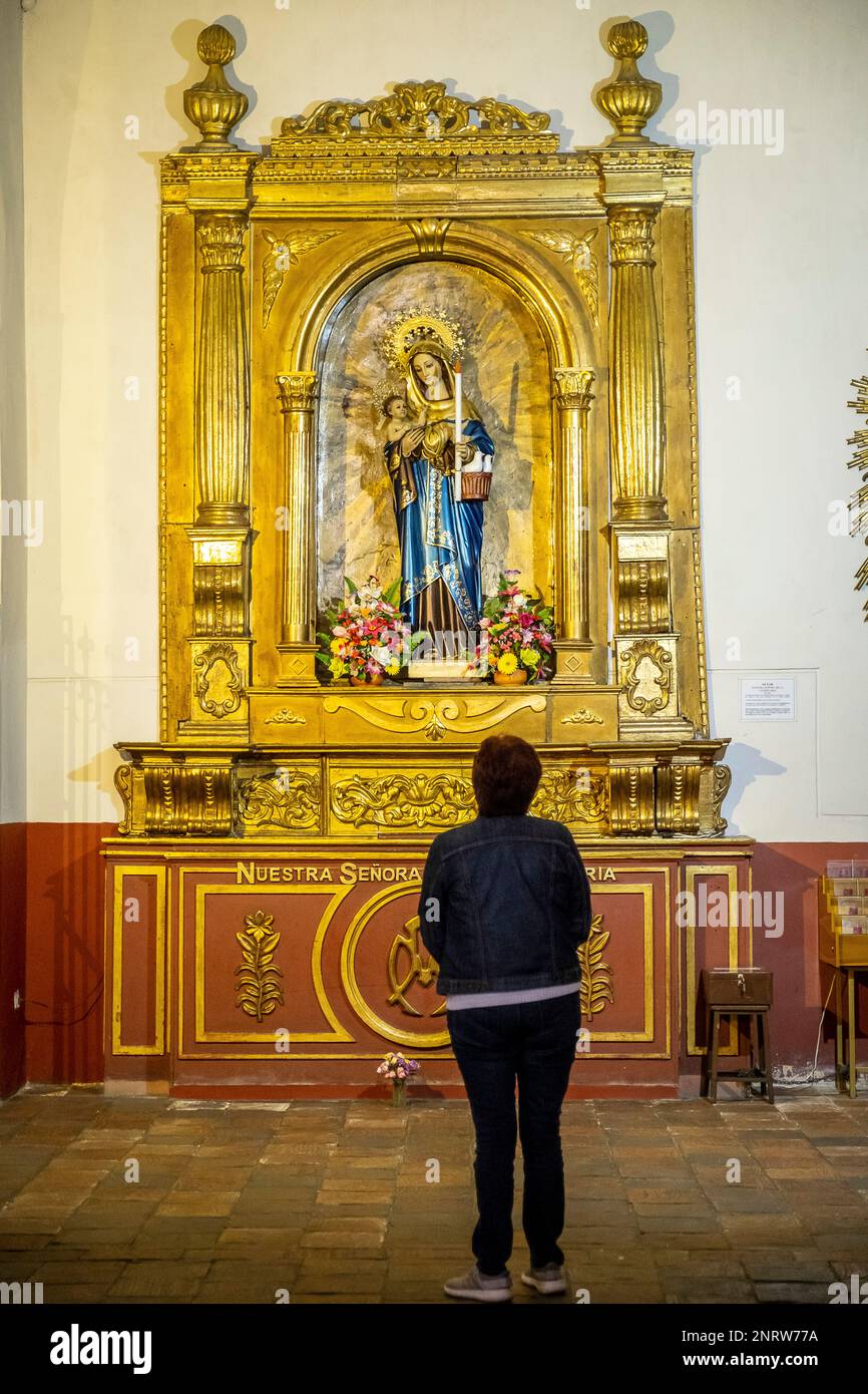 Woman praying, Iglesia de Nuestra Señora de la Candelaria, church ...