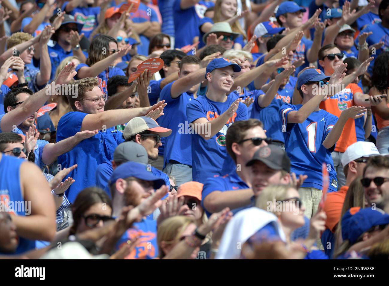 Florida fans perform a cheer in the stands before an NCAA college ...