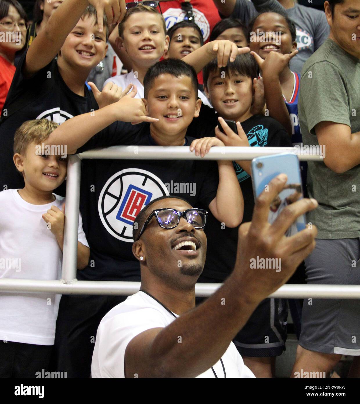 October 6, 2019 - Former Clipper player Craig Smith takes a selfie with ...