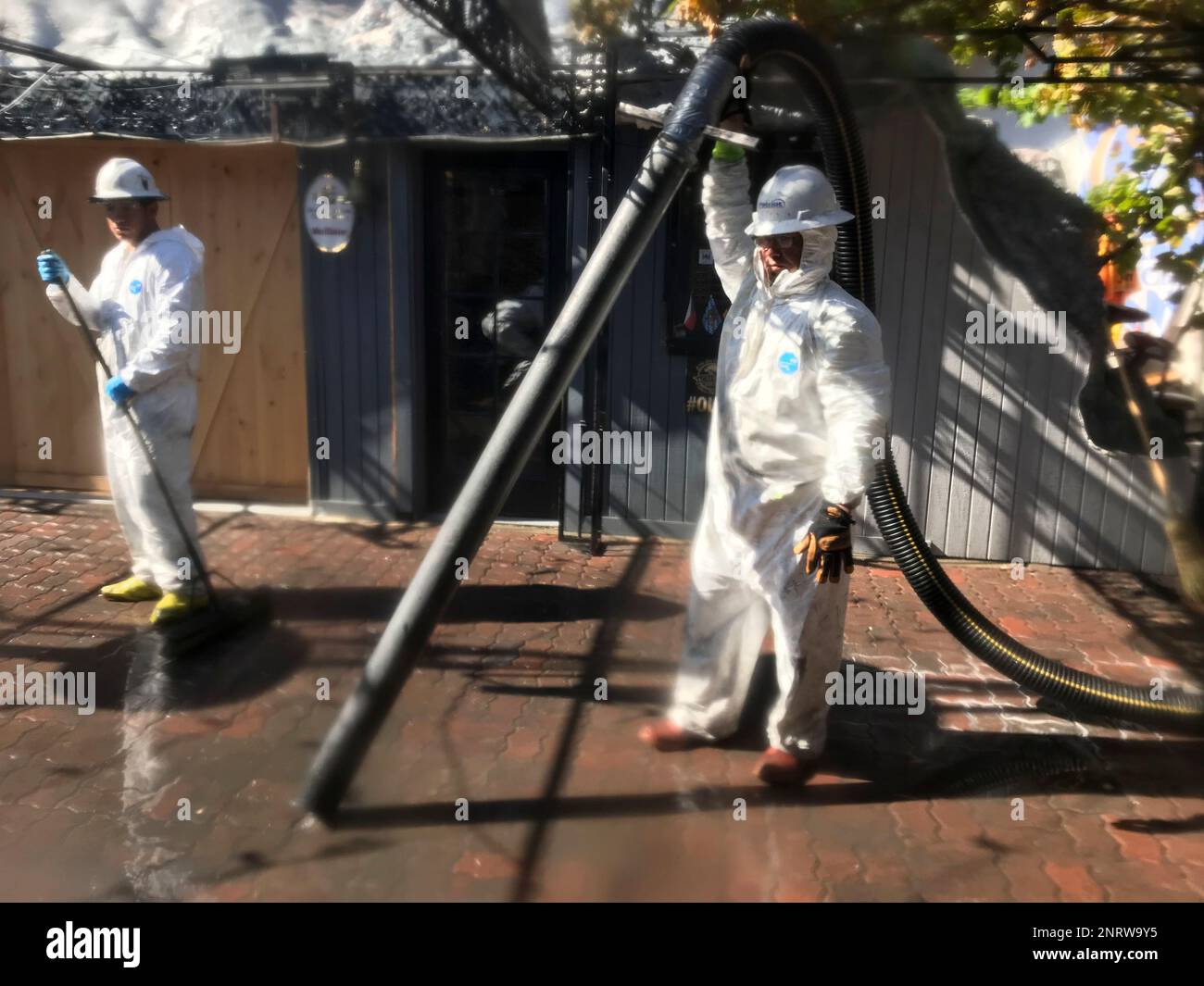 On Sunday, October 6, 2019 contract crews clean up the aftermath of an ...