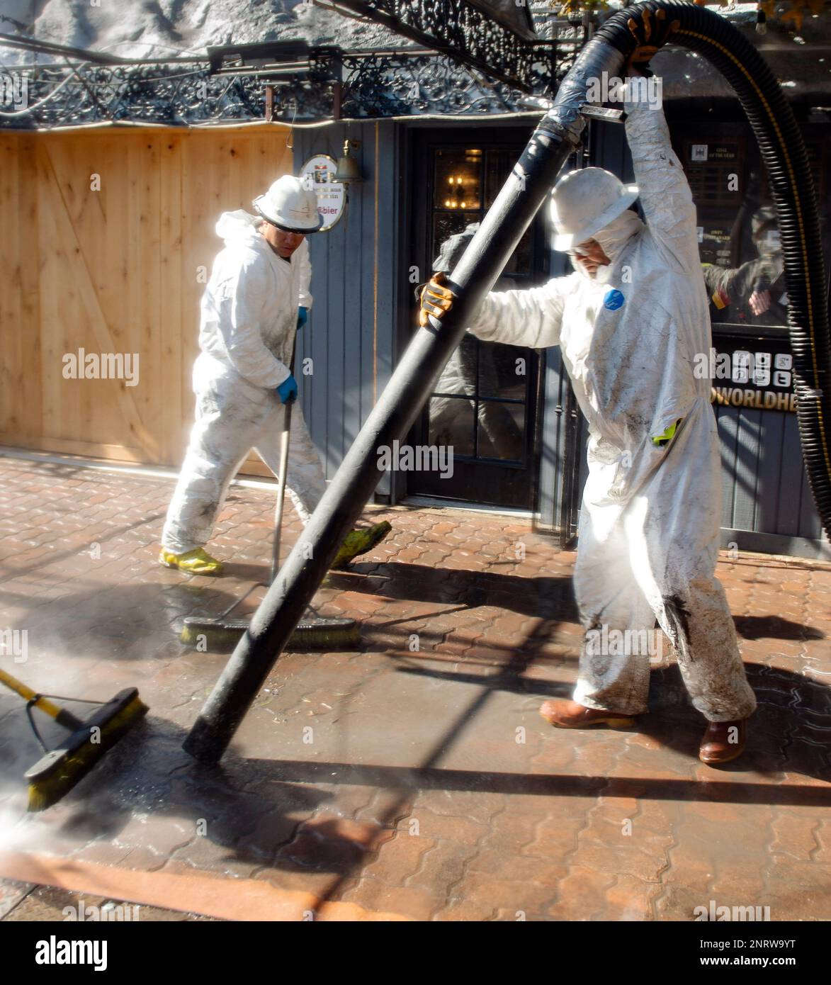 On Sunday, October 6, 2019 contract crews clean up the aftermath of an ...